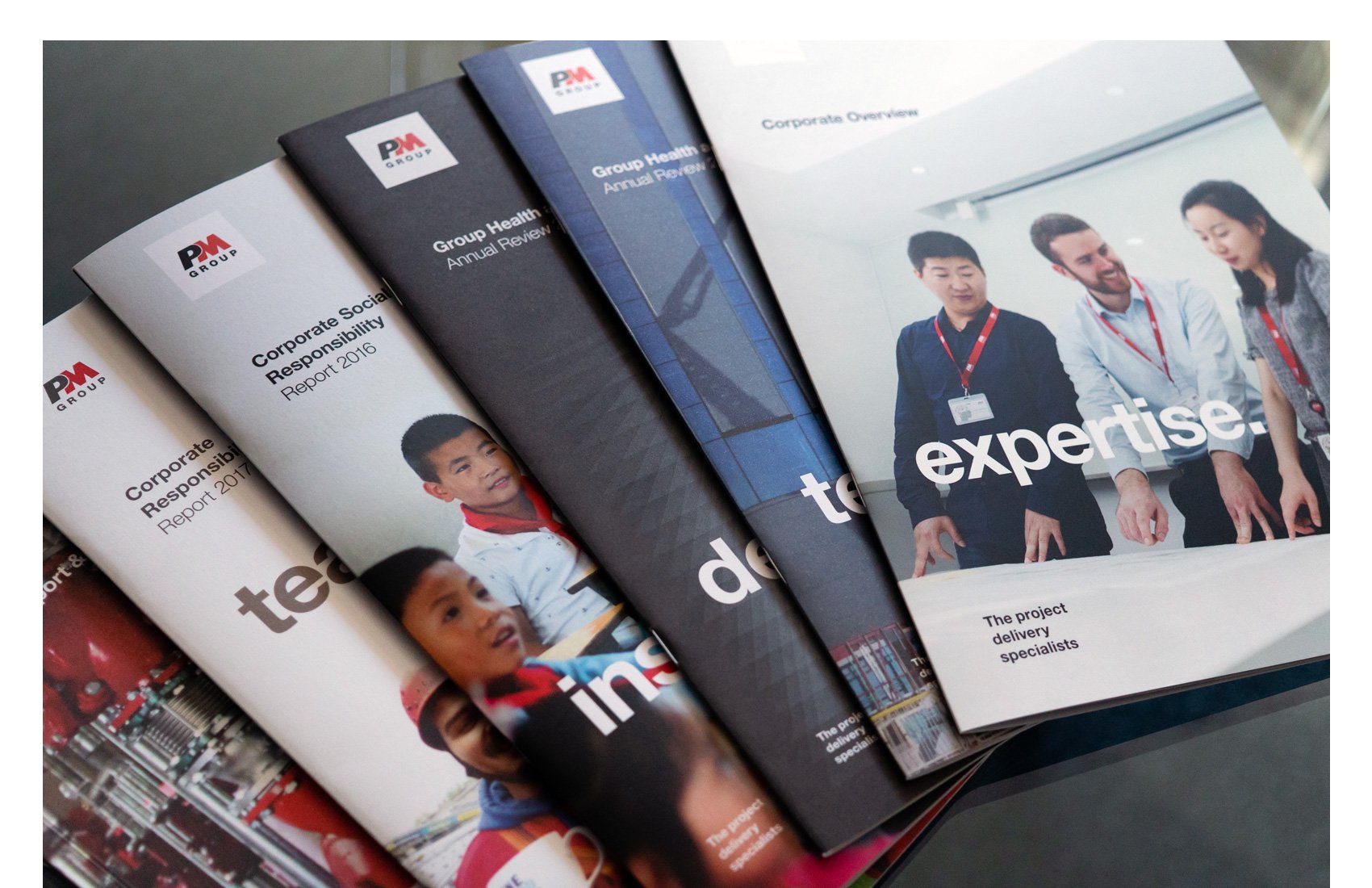 PM Group brand, brochures, reports and marketing material